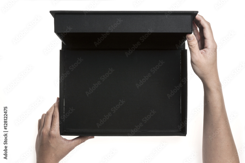Photo Stock Two hands hold a empty(blank) black gift box and open ...