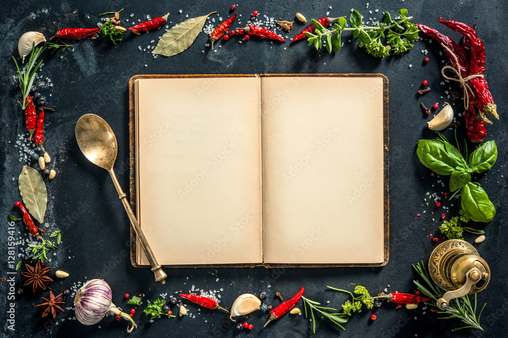 Herbs and spices with a recipe book Stock Photo | Adobe Stock