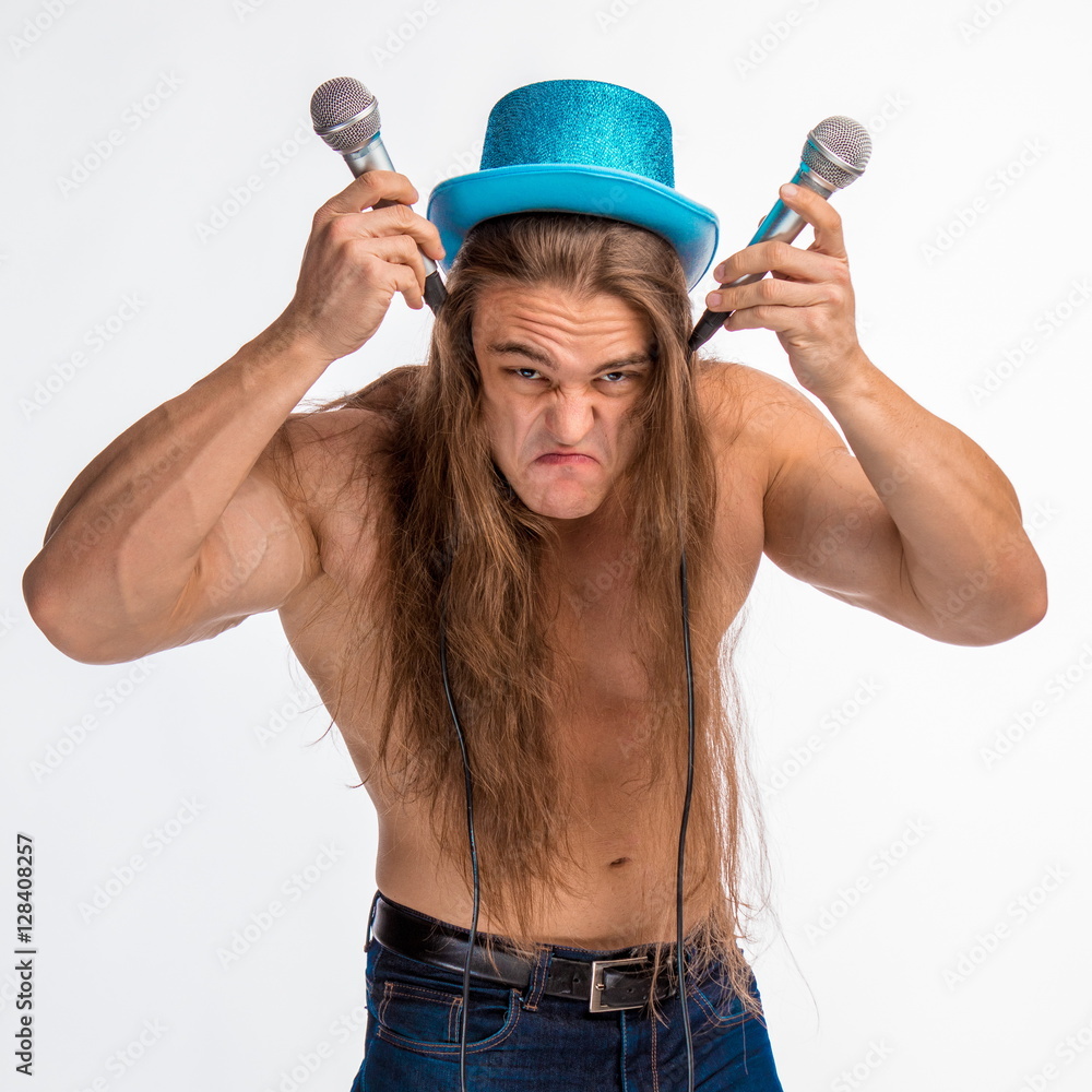 singer bodybuilder shirtless with long hair in a blue hat with a ...