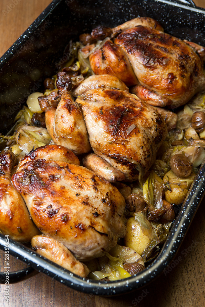 Beautiful golden , crispy oven roasted, free range whole chickens, on a ...