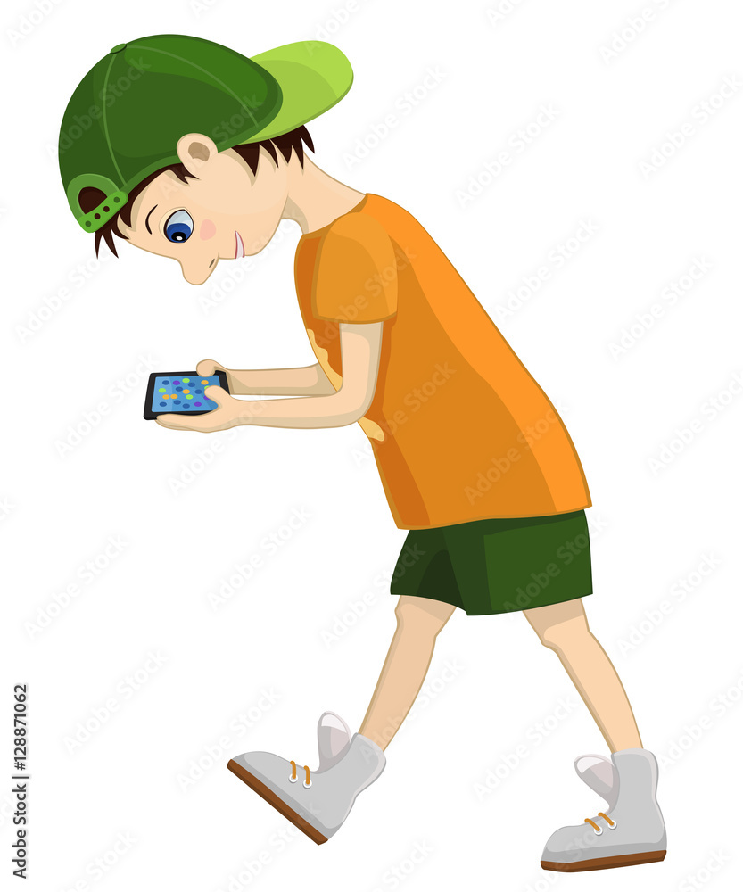 Computer addicted child attentively looks at his tablet. Game and ...