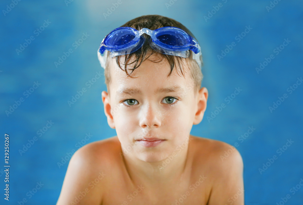 Portrait of cute boy on blurred swimming pool background Stock Photo ...