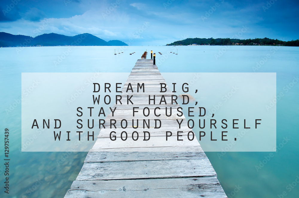 Inspirational motivating quote on long exposure of wooden jetty at sea ...