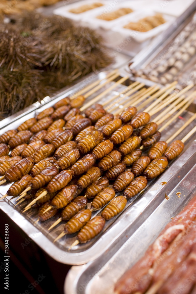 Deep fried silkworm skewers for sale in the Night Market, Wangfujing Street, Beijing, China ...