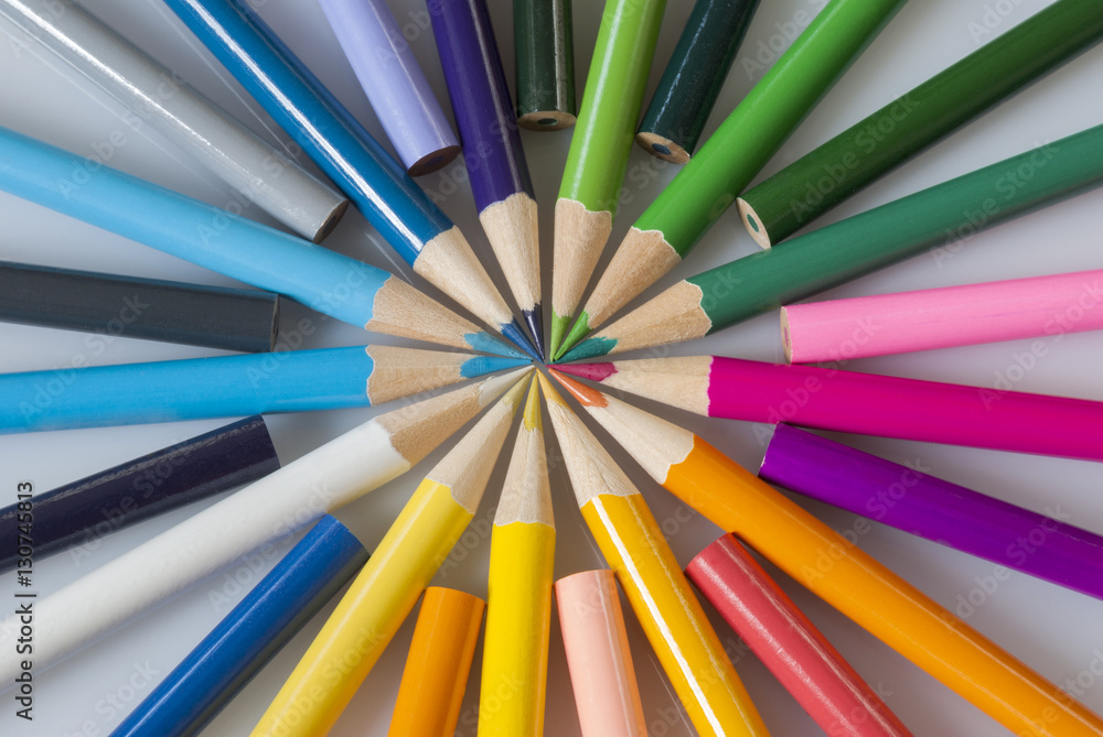 Colorful wooden crayon on white background. Stock Photo | Adobe Stock