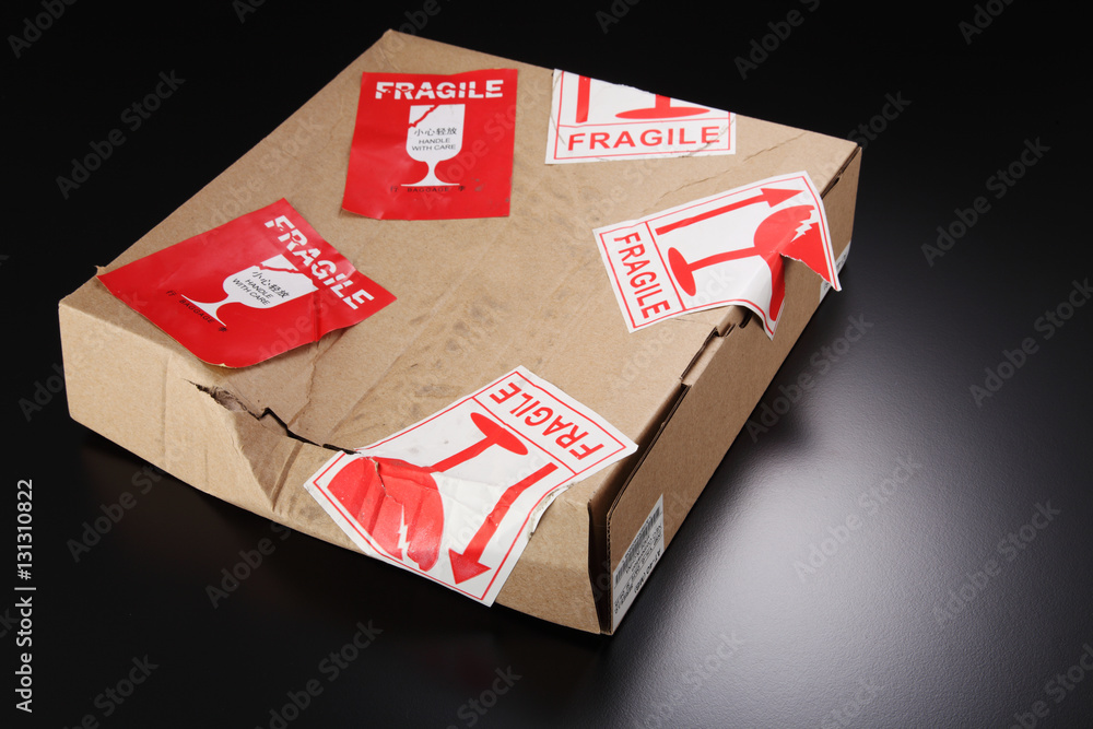 damaged box Stock Photo | Adobe Stock