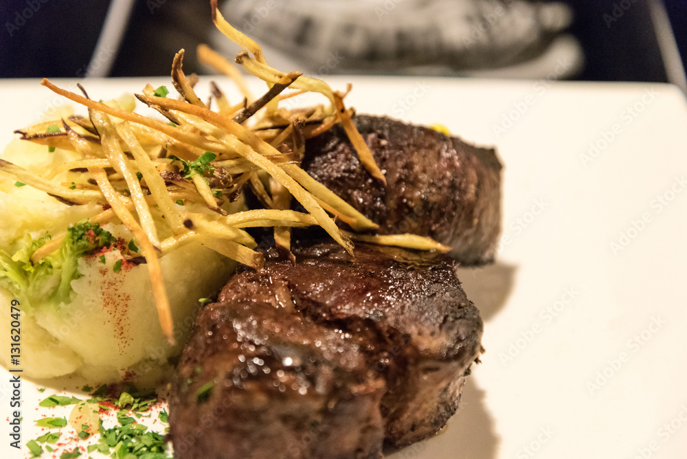 Rib eye steak served in a restaurant of El Calafate, Argentina Stock ...