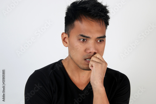 Portrait d' un jeune homme inquiet Photo Stock | Adobe Stock