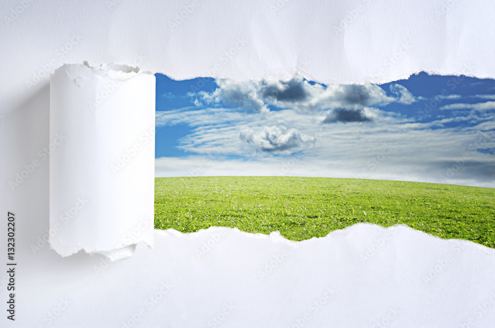 Torn paper with nature in opening background Stock Photo | Adobe Stock