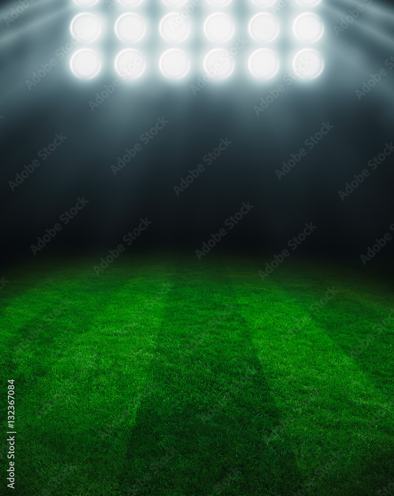 Illuminated football field at night Stock Photo | Adobe Stock