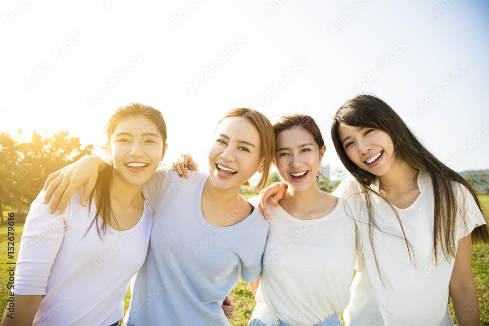 Group of young beautiful women smiling Stock Photo | Adobe Stock