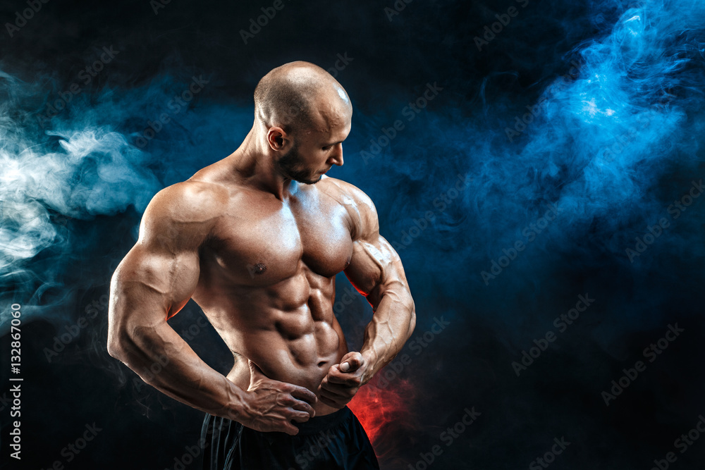 Foto de Stock Strong bald bodybuilder with six pack. Bodybuilder man ...