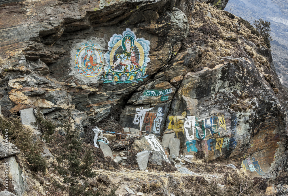 Foto de Stock The ancient image of guru Rinpoche on a rock near village ...