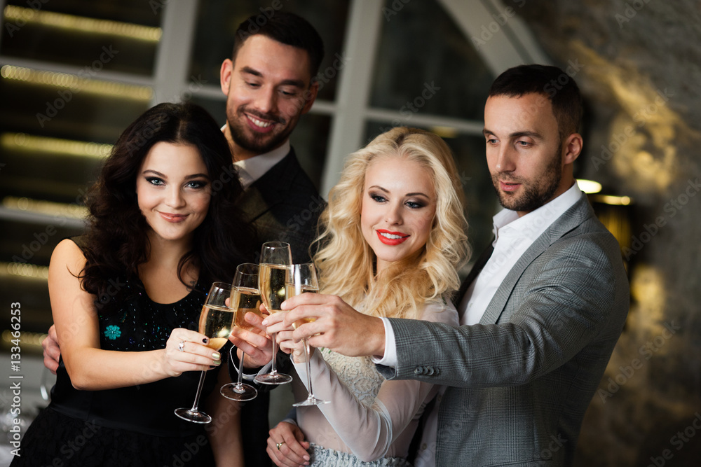 Four friends celebrating Stock Photo | Adobe Stock