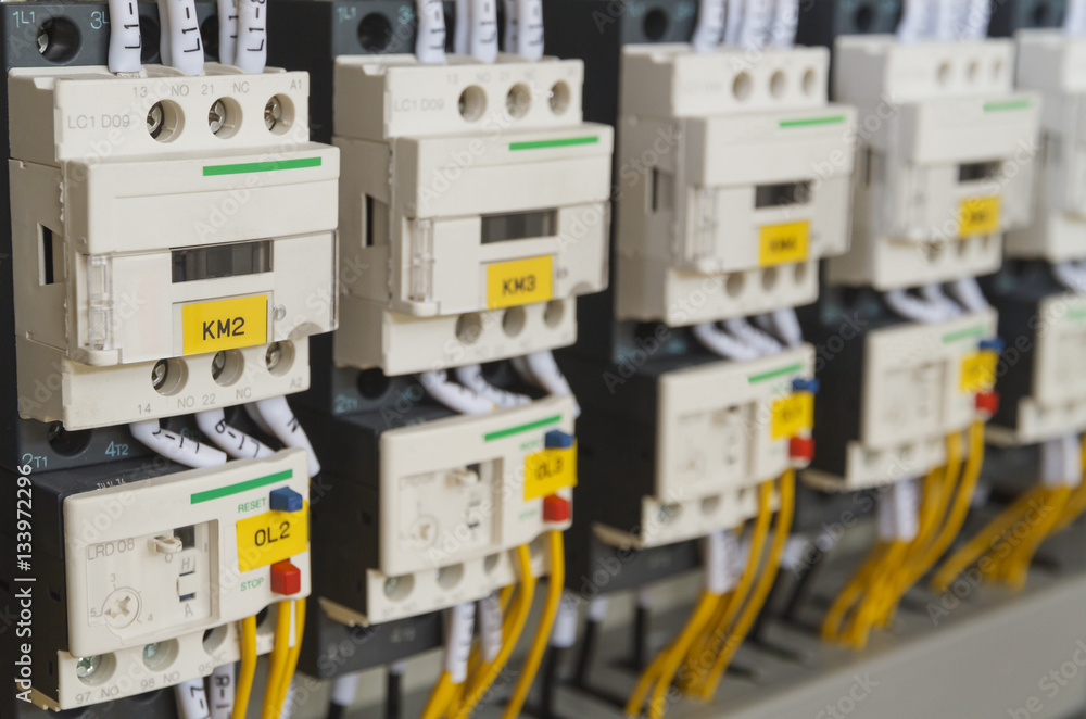 Close-up electrical wiring with fuses and contactors of machine ...