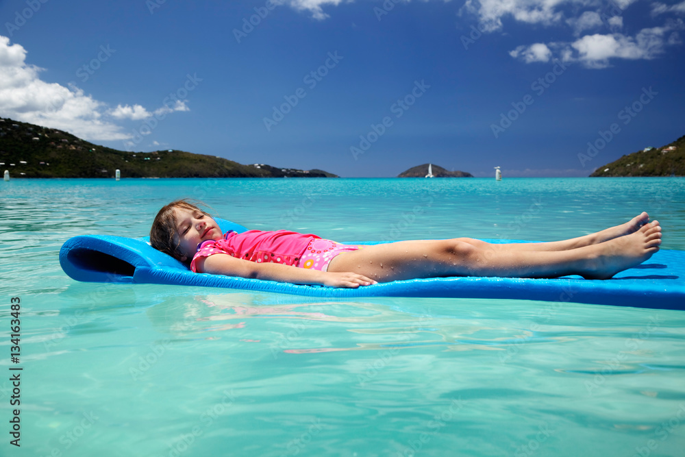 Foto de Stock Little girl drifting and dozing in Magens Bay, St. Thomas ...