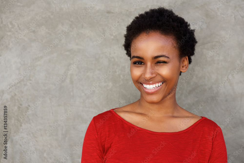 beautiful young black woman winking eye and smiling Stock Photo | Adobe ...