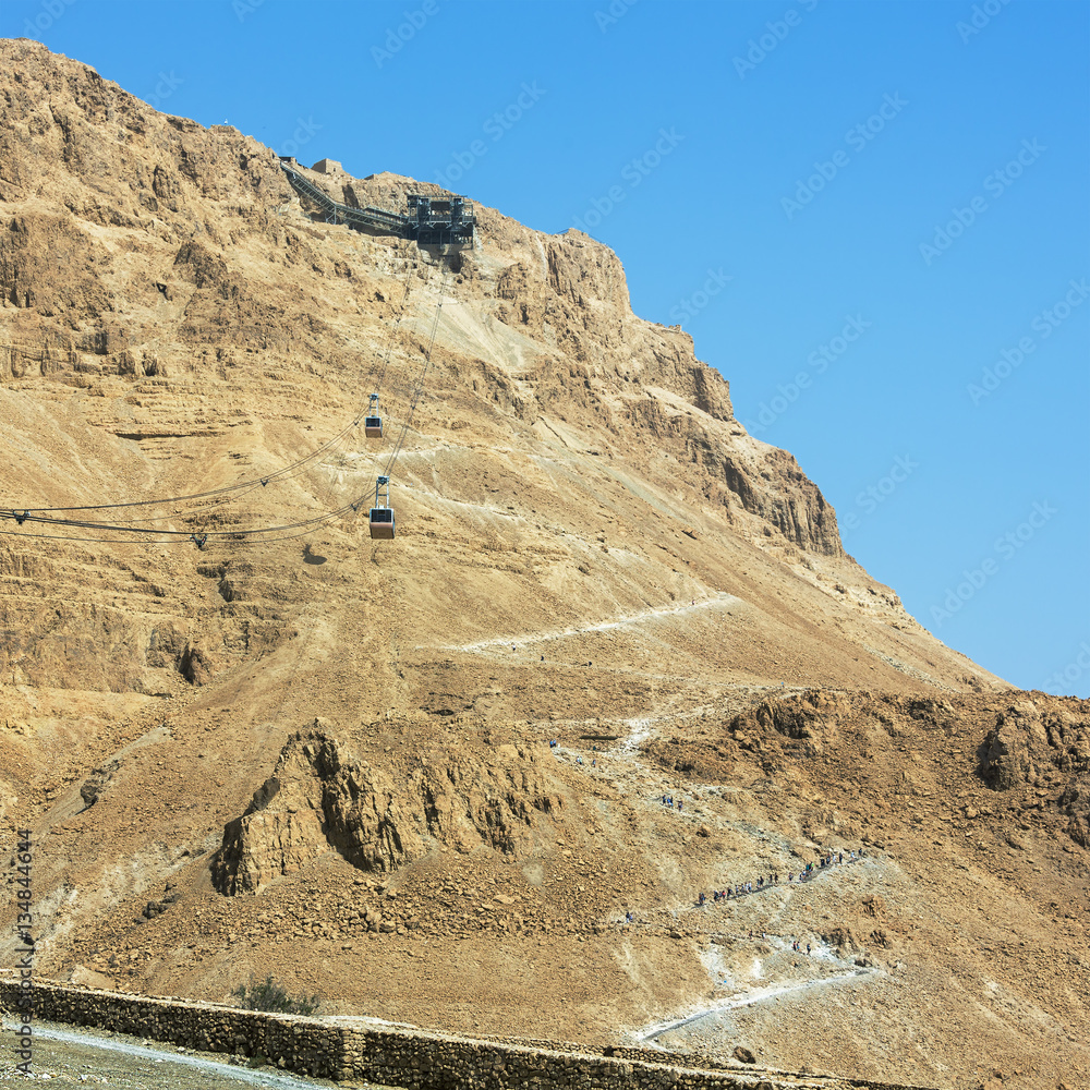 The cable car transporting passengers and hiking trail in ancient ...