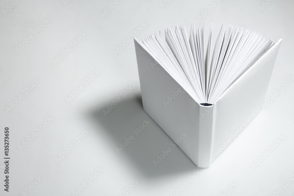 Open empty white book. Top view. Stock Photo | Adobe Stock