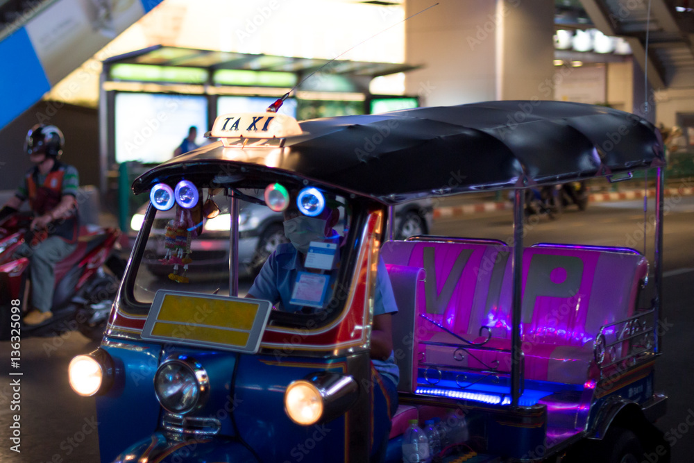 Letter taxi on famous Tuk-Tuk moto taxi on the street in the Tha Stock ...