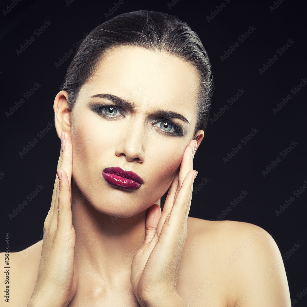 Young caucasian girl with emotional face and toned skin. Make-up red ...