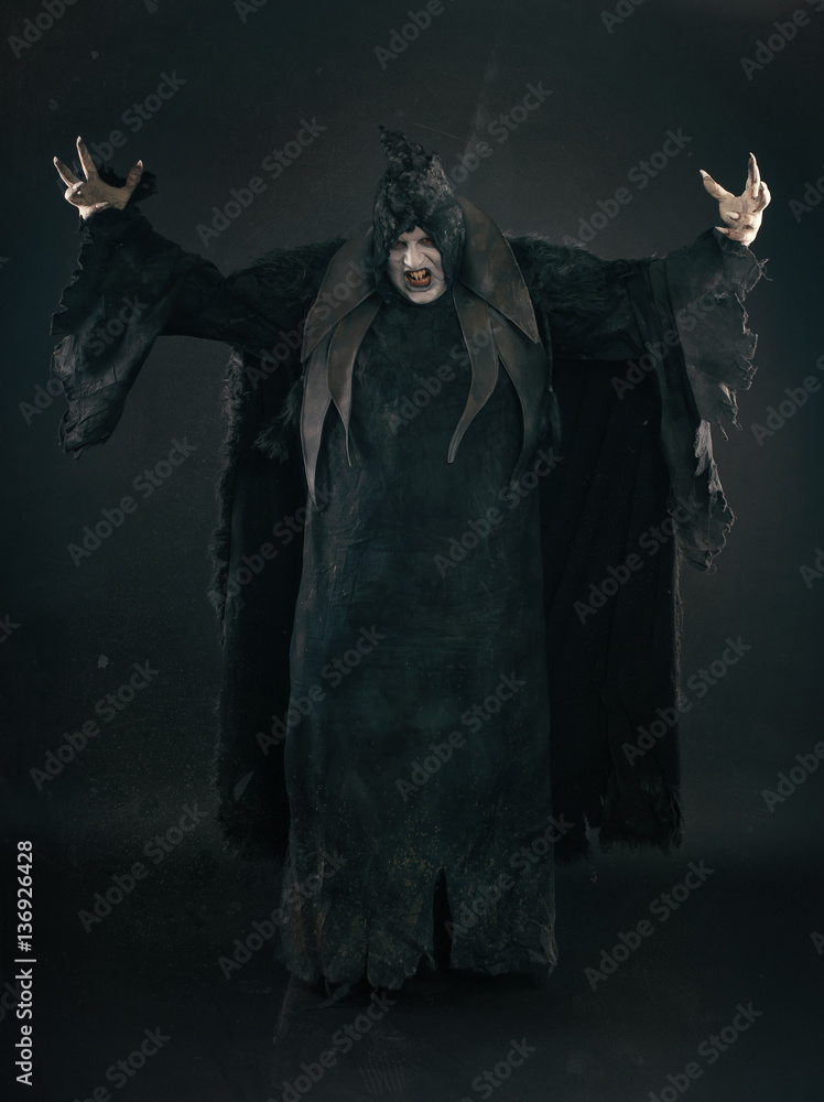 Stock-Foto „Spooky devil vamp with large scary nails. Hell and horror ...