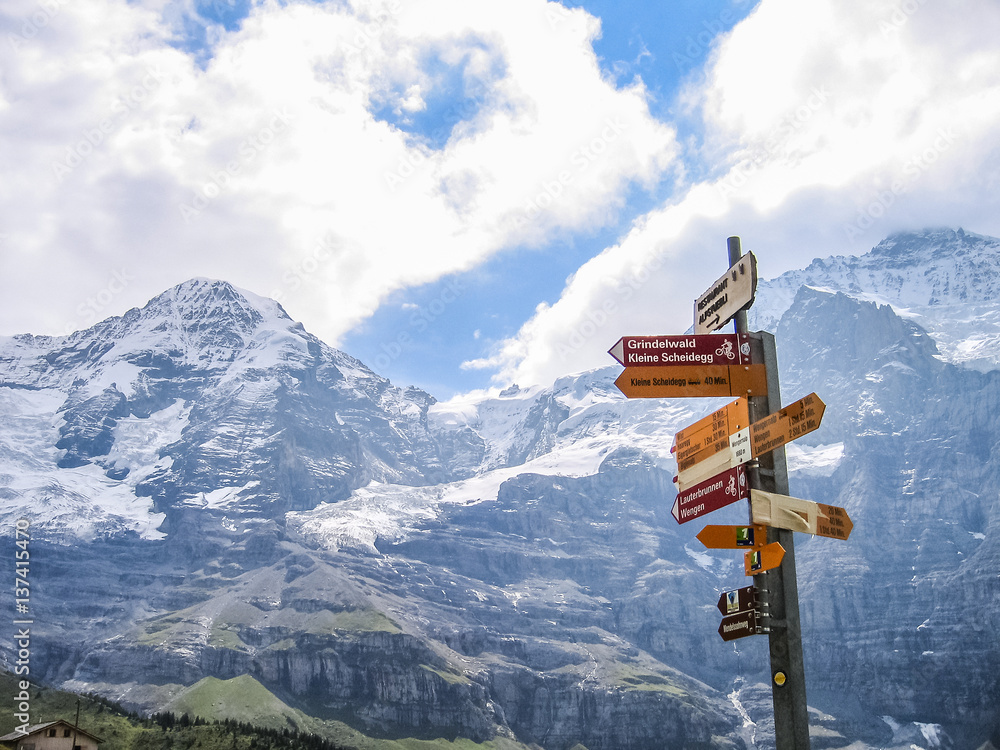 Interlaken, Switzerland village with many street signs for hiking Stock ...