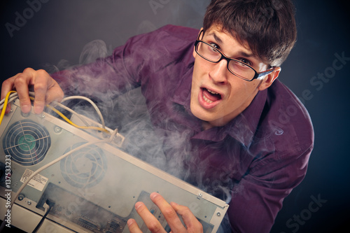 Nerd With Smoke Coming Out Of His Pc - Buy this stock photo and explore ...