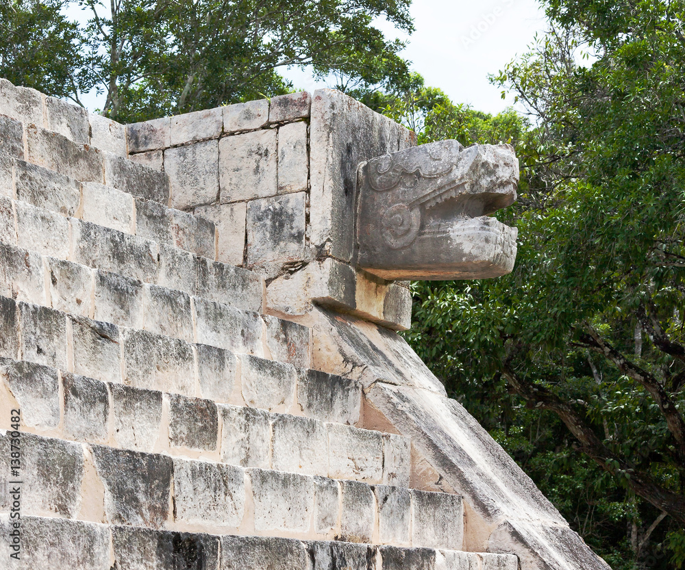 The head of the snake at the base of the pyramid in Chichen Itza ...