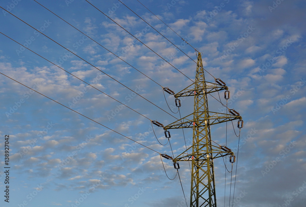 Tall electric pylon leading high current and voltage as a symbol of ...