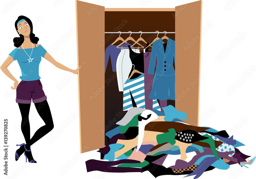 Dissapointed woman looking at her wardrobe, pile of clothes falling out ...