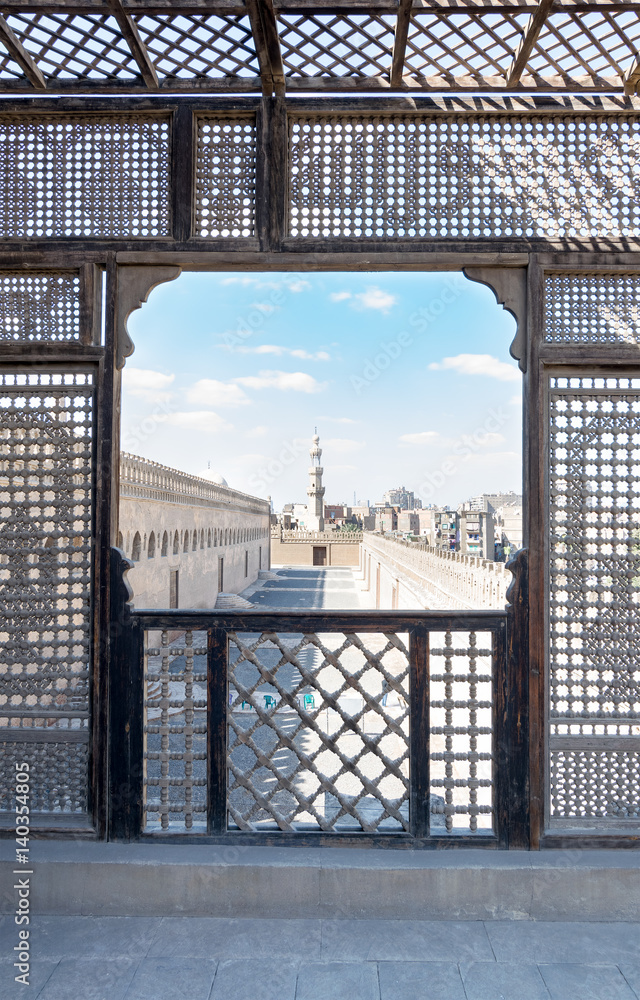 Passage surrounding the Mosque of Ibn Tulun framed by interleaved ...