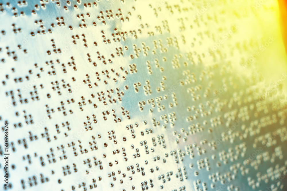 Braille text on metal sheet for blind people with color filter added ...