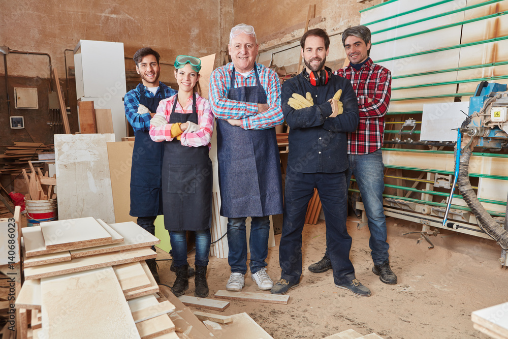 Chef und sein Team in Werkstatt Stock Photo | Adobe Stock