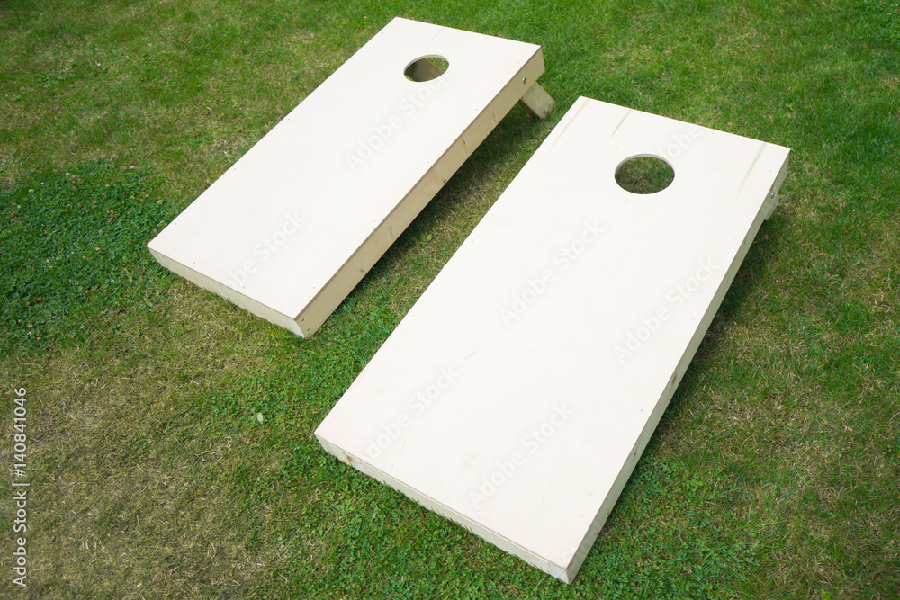 Foto Wooden Cornhole Boards on Grass do Stock | Adobe Stock