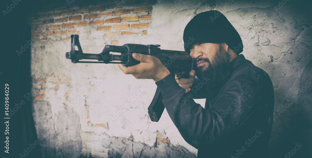 terrorist in black uniform and mask with kalashnikov Stock Photo ...
