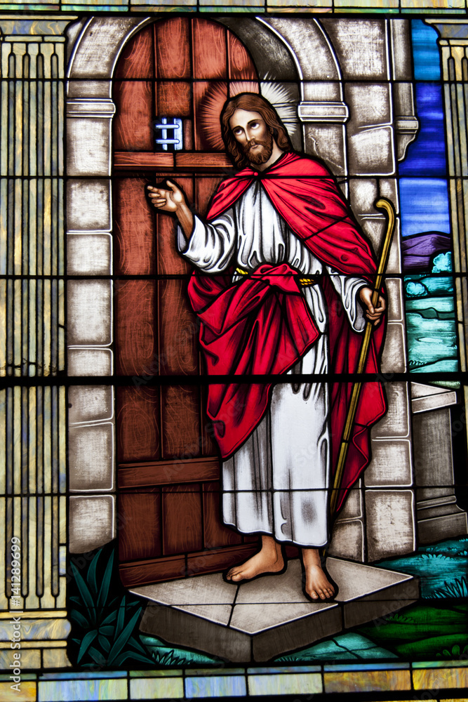 Gorgeous stained glass window of Jesus Christ knocking on door. Stock ...