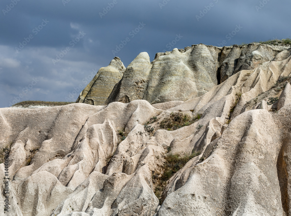 A geological formation consisting of volcanic tuff. Cappadocia in ...