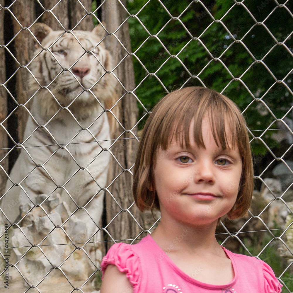 Cute little girl at zoo Stock Photo | Adobe Stock