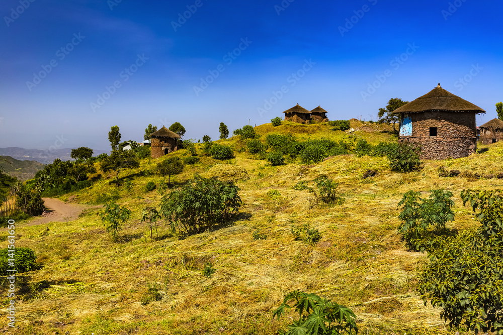 Ethiopia. Lalibela. Traditional round houses built of stone with a cone ...