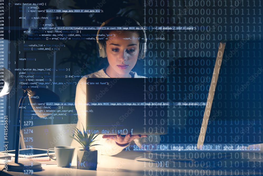 Program development concept. Young woman listening to music while ...