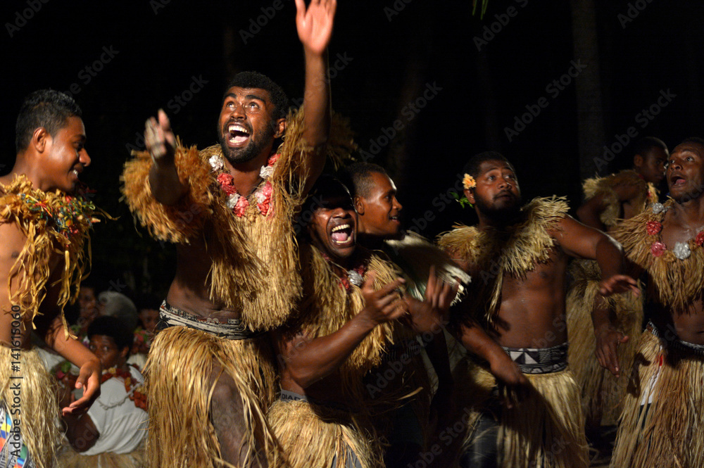 Fijian men dancing a traditional male dance meke wesi in Fiji Stock ...