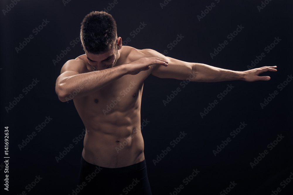 one young man, shirtless "dub" (dance) pose Stock Photo | Adobe Stock