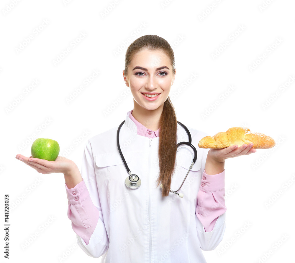 Young female nutritionist on white background Stock Photo | Adobe Stock