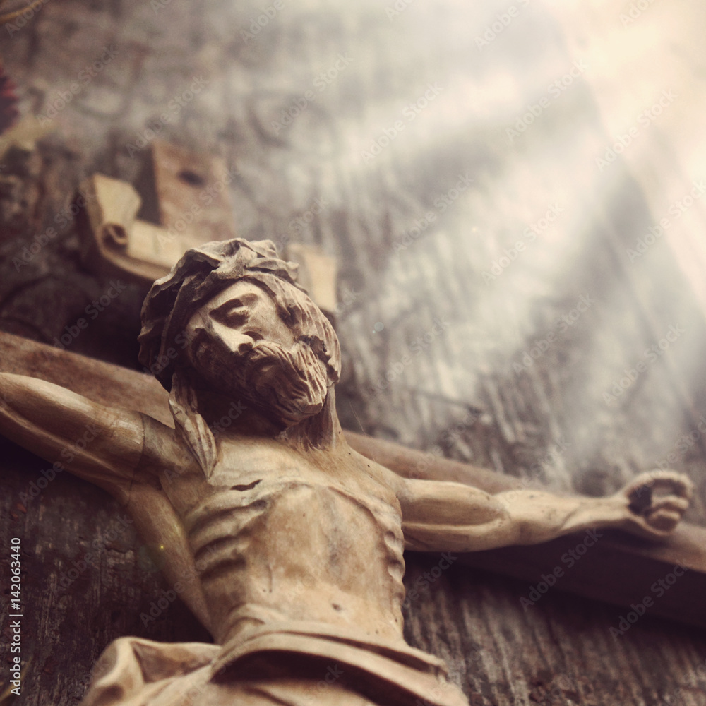 Jesus Christ crucified (an ancient wooden sculpture) Stock Photo | Adobe Stock
