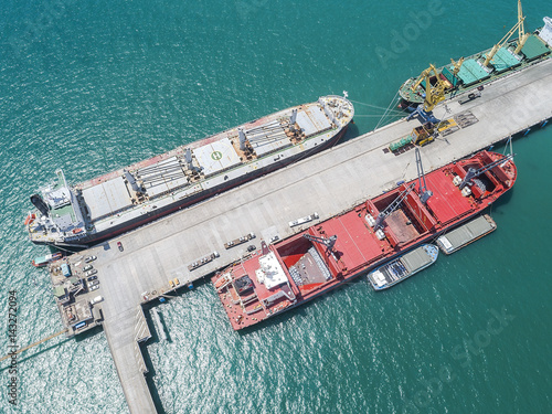 ships vessels are alongside berthed in jetty terminal of port loading ...