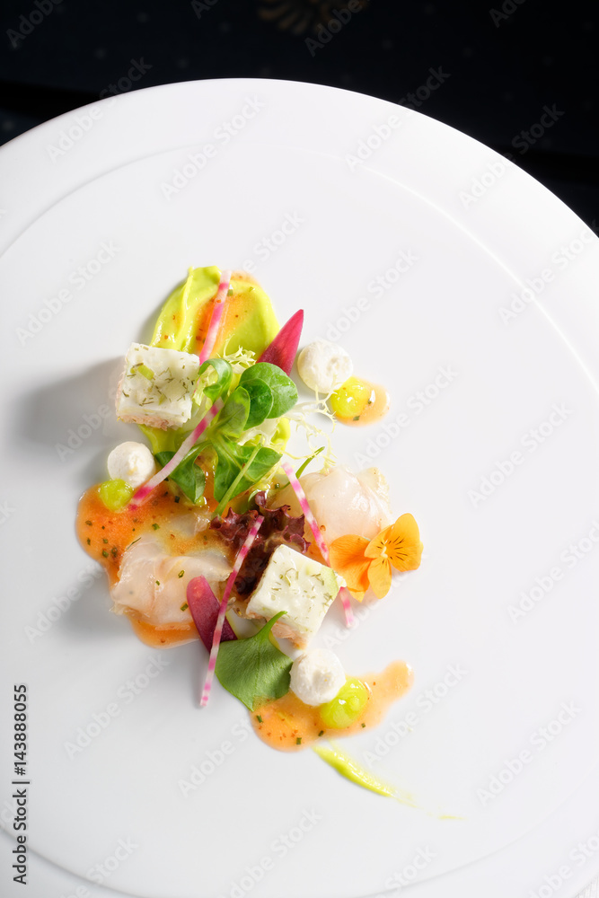 Fine dining, Elegant seabass tartare with avocado and pesto topped ...