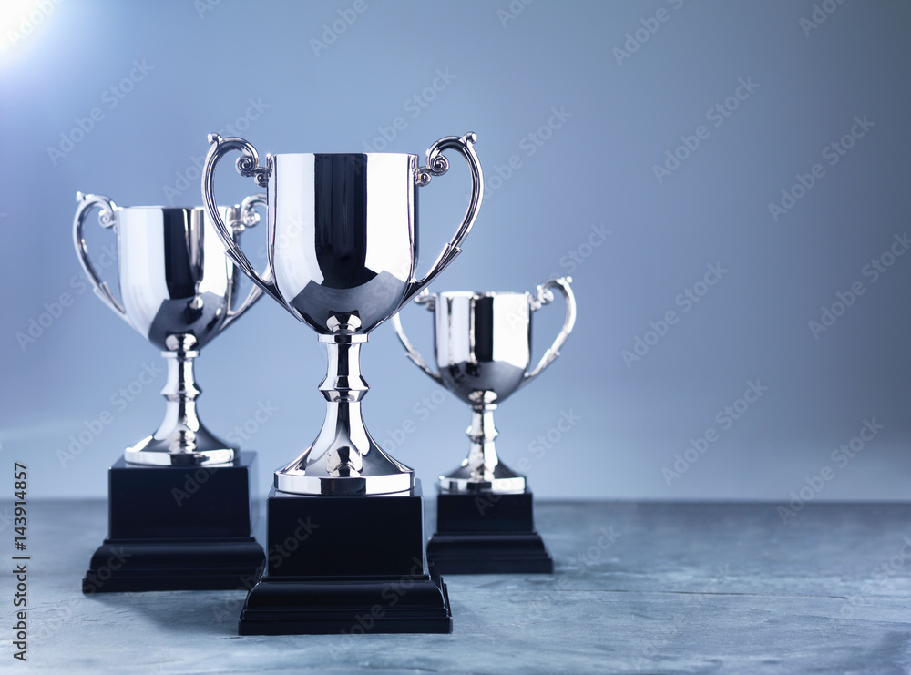 Still life of three trophies awaiting the winners' presentation Stock ...