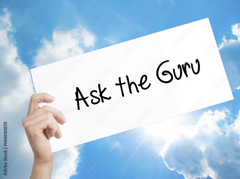 Ask the Guru Sign on white paper. Man Hand Holding Paper with text ...