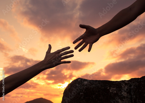 Lending a helping hand. People helping each other and teamwork concept ...